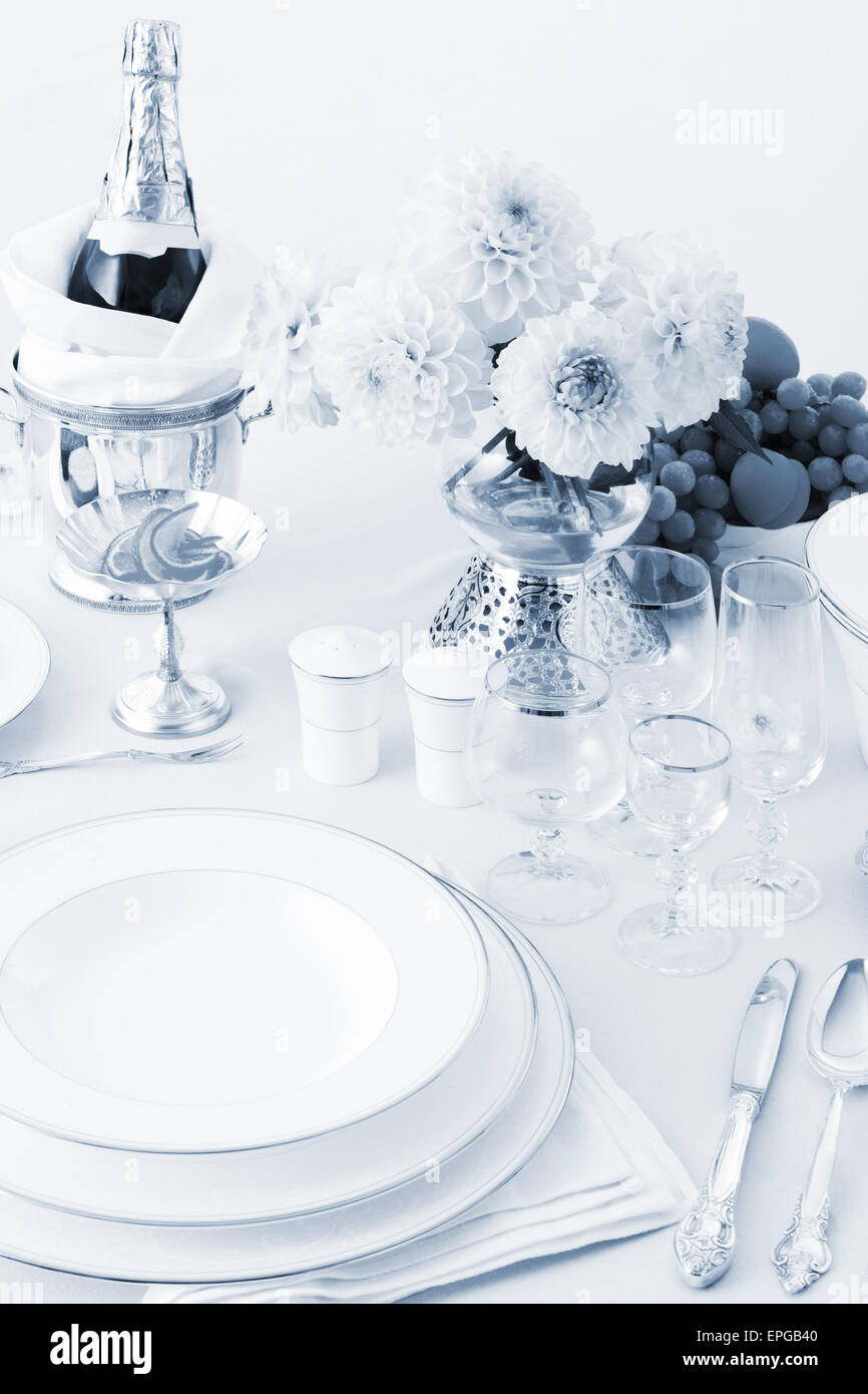 a table with dishes Stock Photo - Alamy