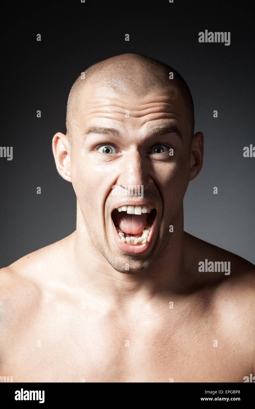 portrait of screaming man isolated on gray Stock Photo - Alamy