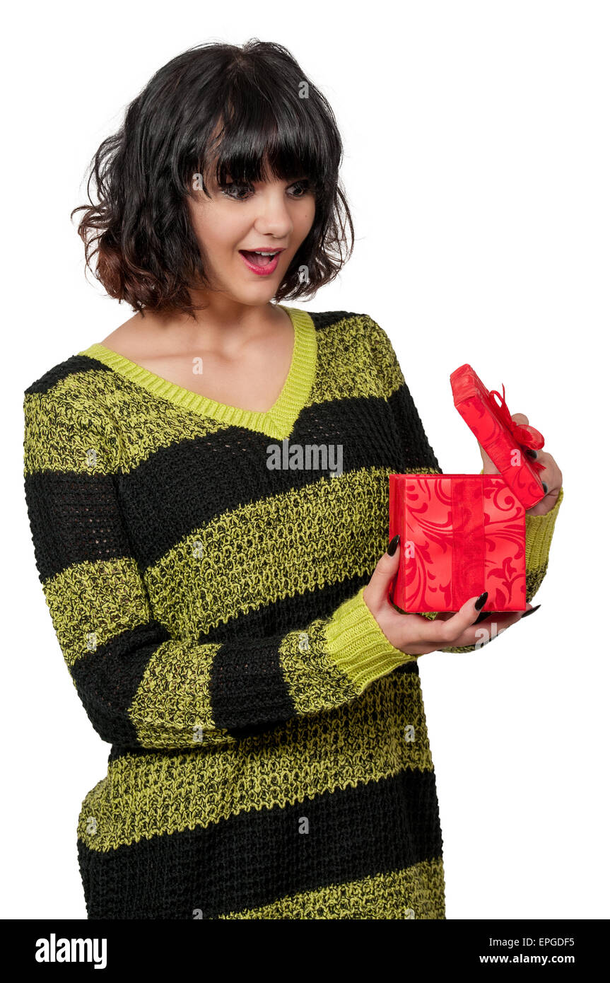 Beautiful woman opening a present Stock Photo - Alamy