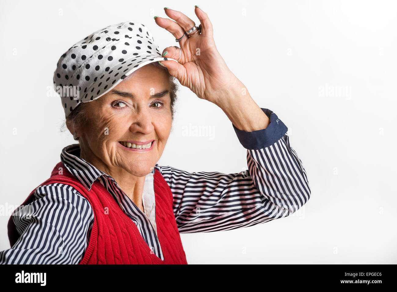 studio portrait of 83 old looking good white senior woman on white ...