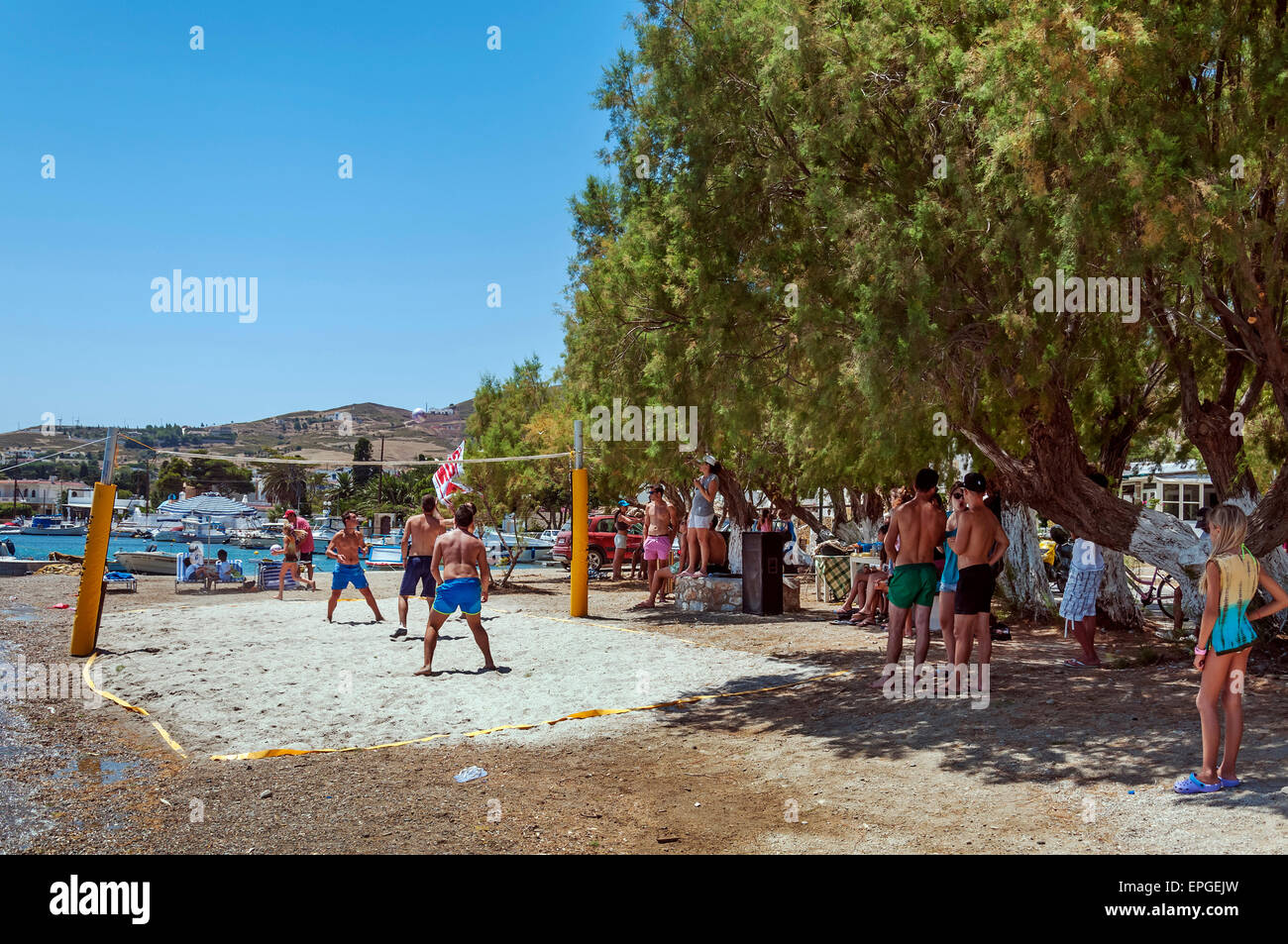 Locals playing volleyball at Alinda beach Stock Photo - Alamy
