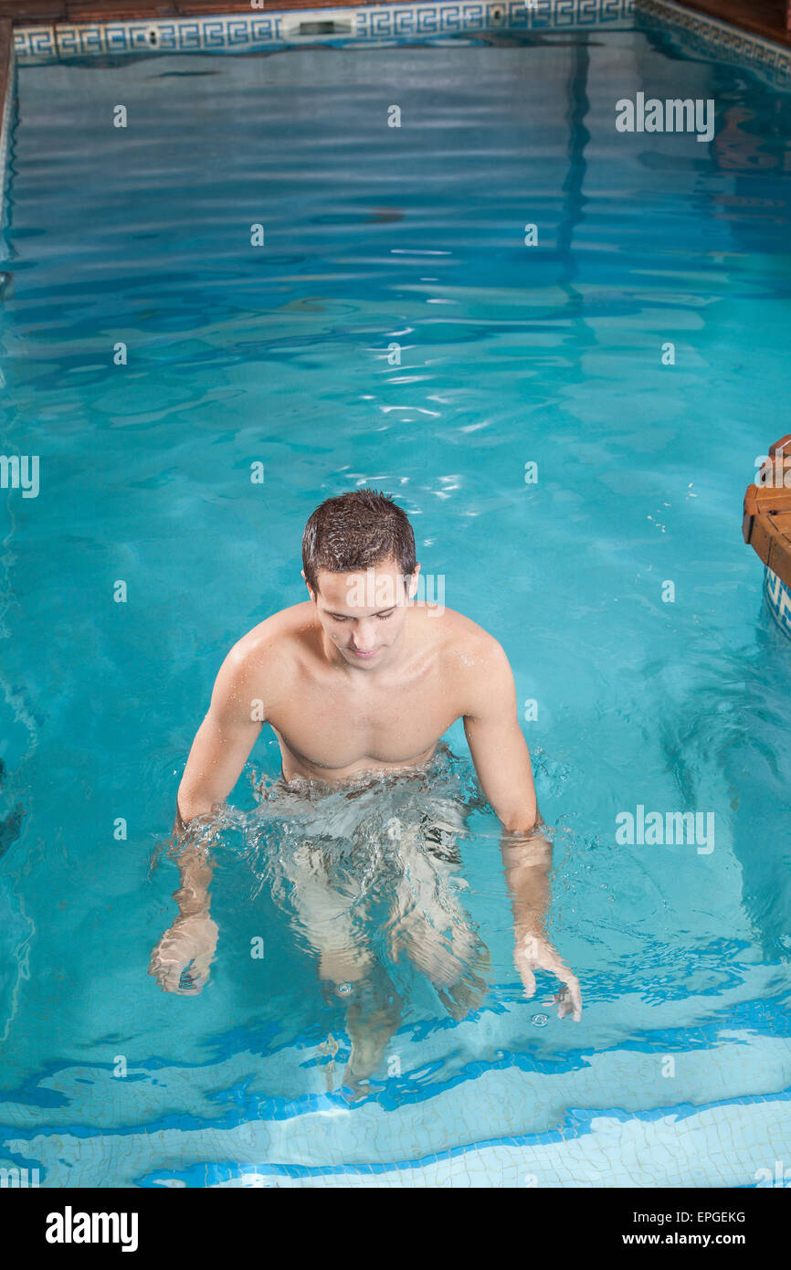 Man in to the pool Stock Photo - Alamy