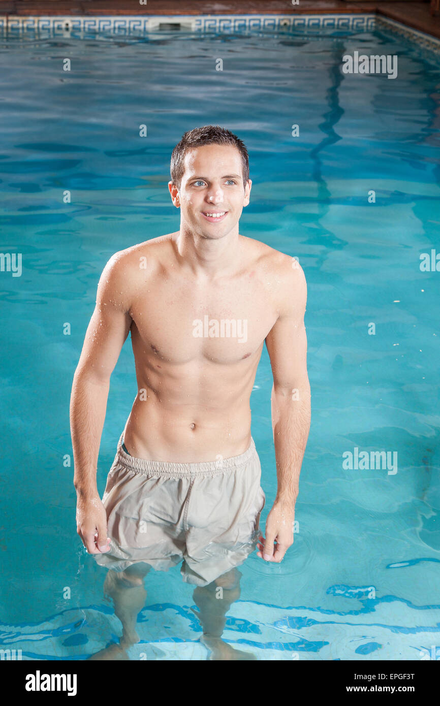 Man in to the pool Stock Photo - Alamy