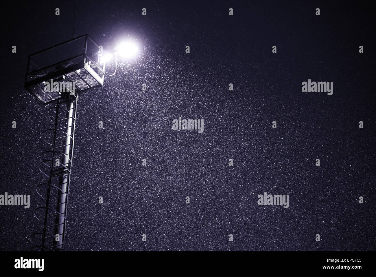 snowfall at night with lantern light Stock Photo - Alamy