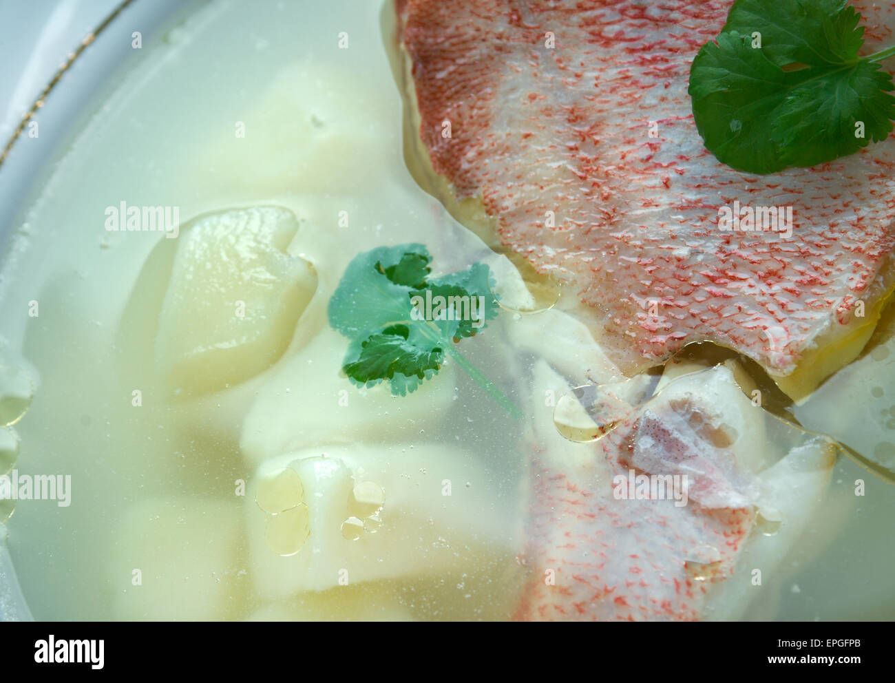 fish soup with red grouper Stock Photo - Alamy