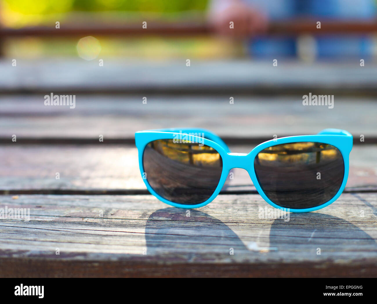 Close up of a turquoise glasses Stock Photo - Alamy