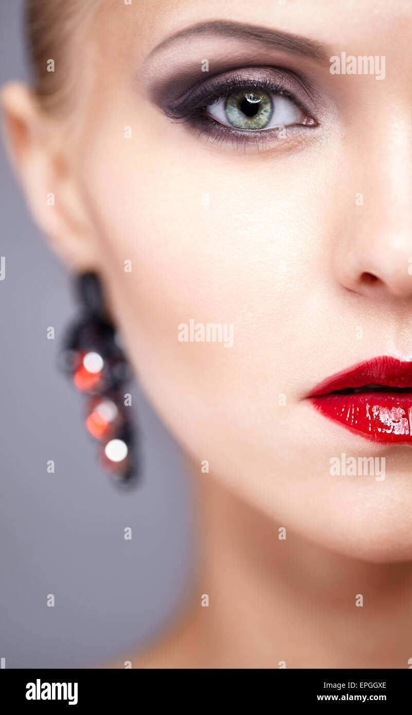 Half face close-up portrait of young woman Stock Photo - Alamy