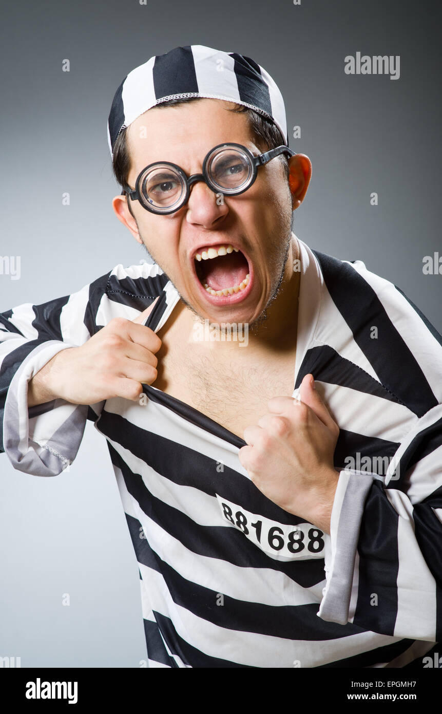 Funny prison inmate in concept Stock Photo - Alamy