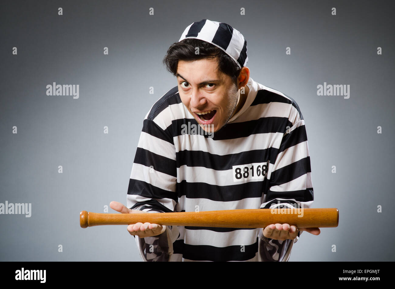 Funny prison inmate in concept Stock Photo - Alamy