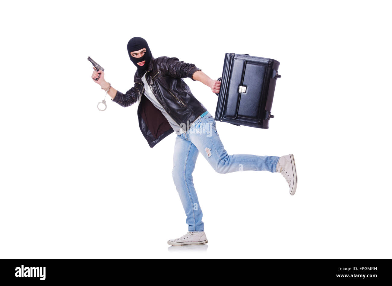 Robber with stolen suitcase and gun Stock Photo - Alamy