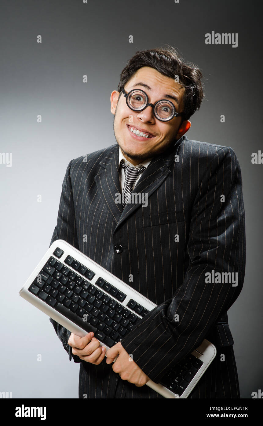 Comouter geek with computer keyboard Stock Photo - Alamy