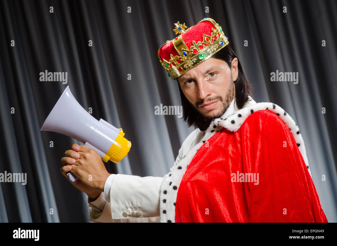 King with loudspeaker in funny concept Stock Photo - Alamy