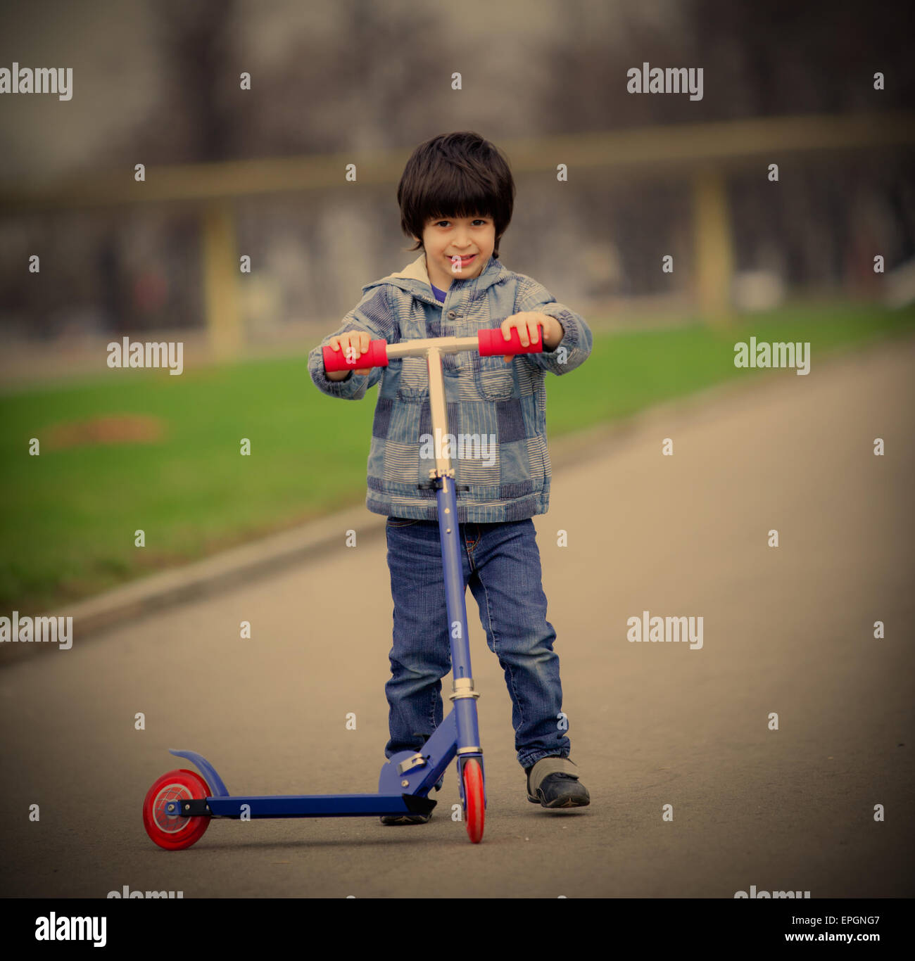 boy with scooter Stock Photo - Alamy