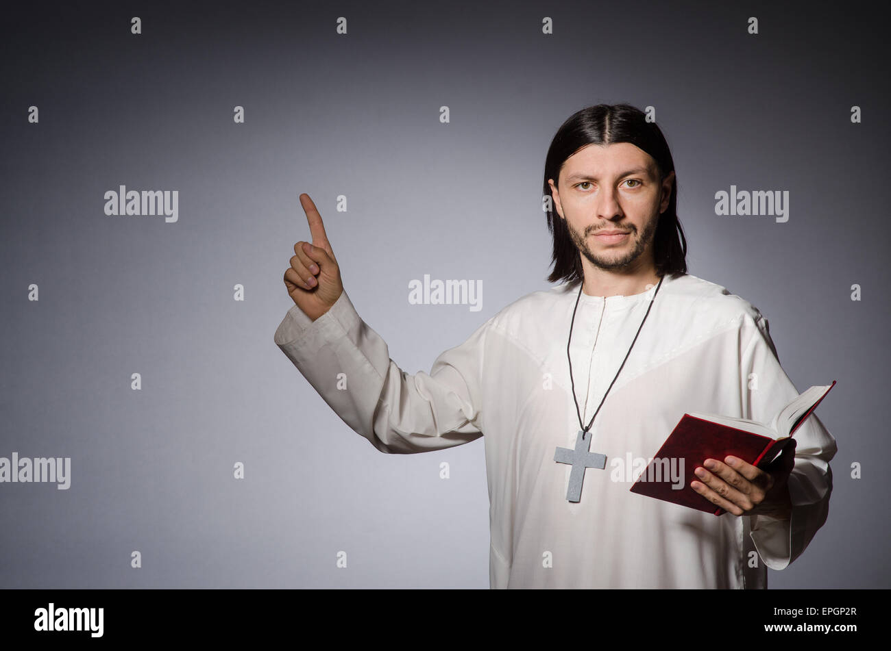 Priest man in religious concept Stock Photo - Alamy