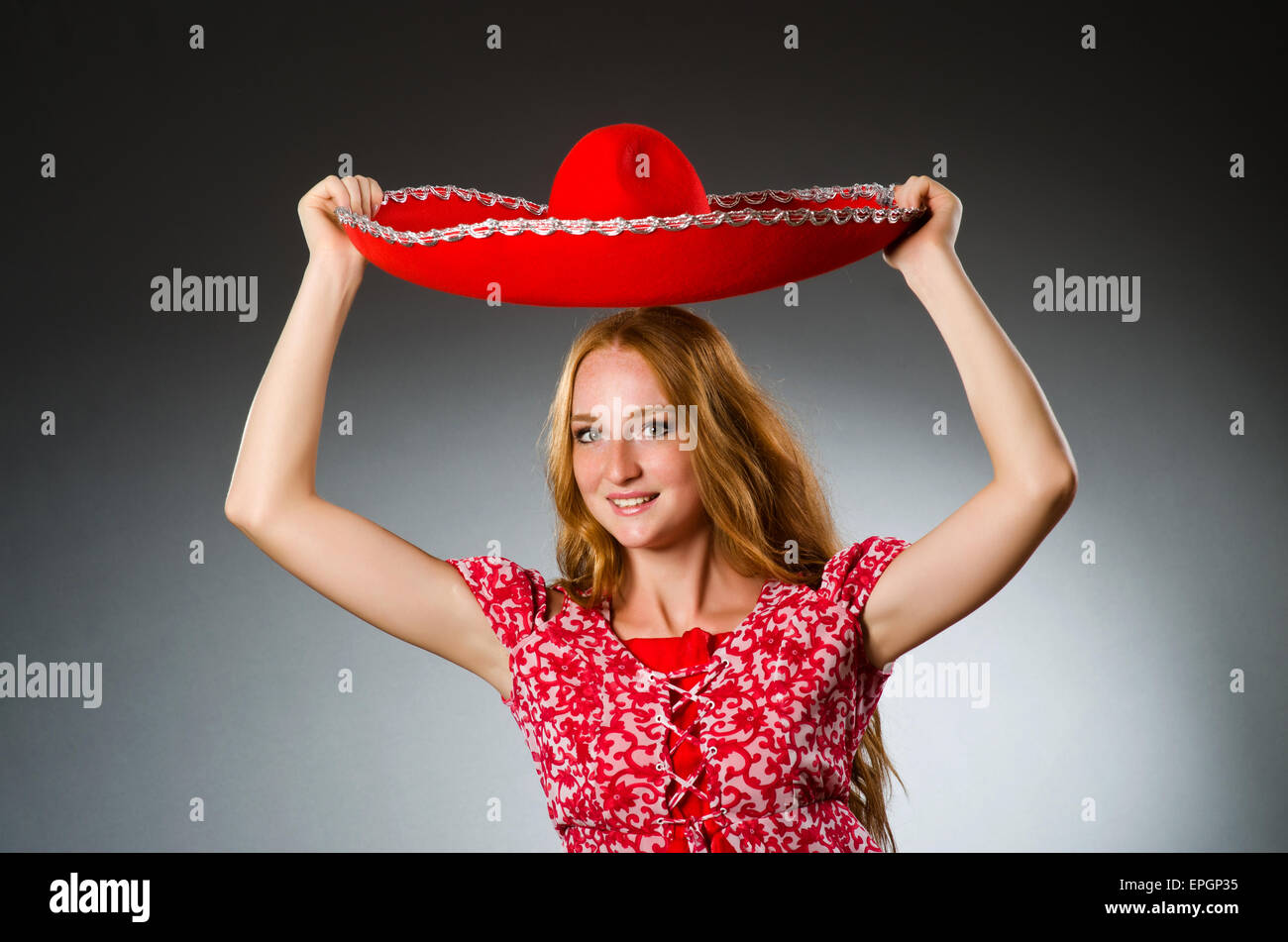 Mexican woman wearing red sombrero Stock Photo - Alamy