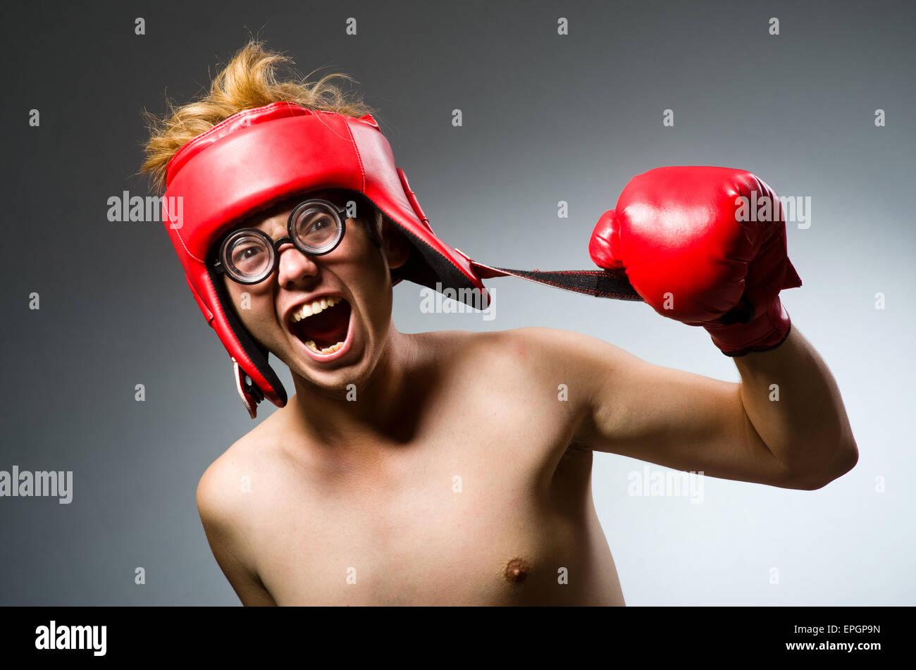 Funny boxer against dark background Stock Photo - Alamy