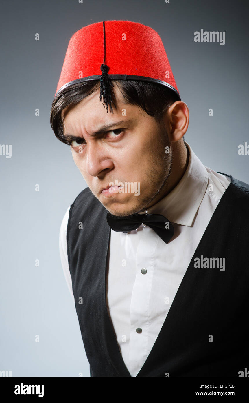 Man wearing traditional turkish hat fez Stock Photo - Alamy
