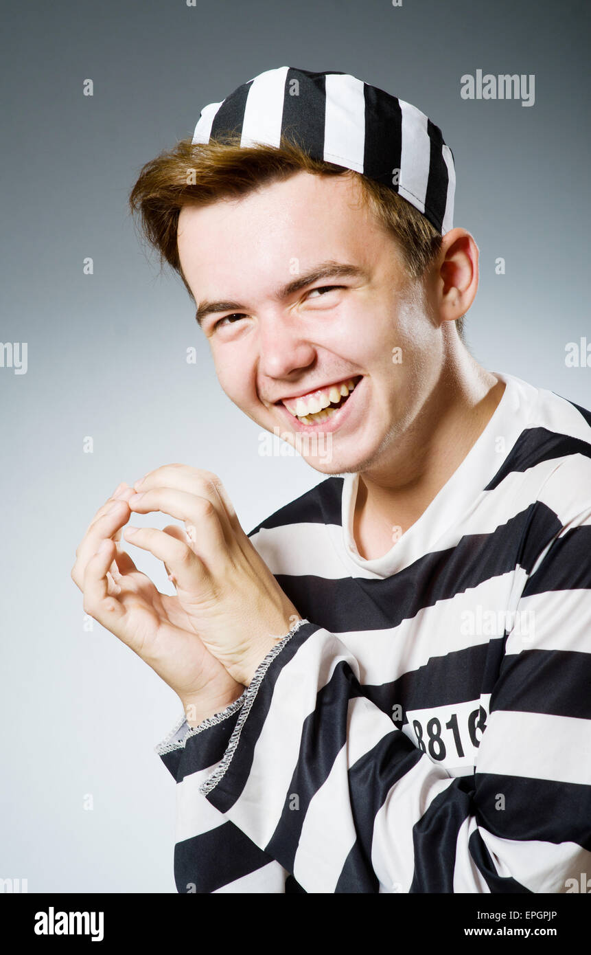 Funny prison inmate in concept Stock Photo - Alamy