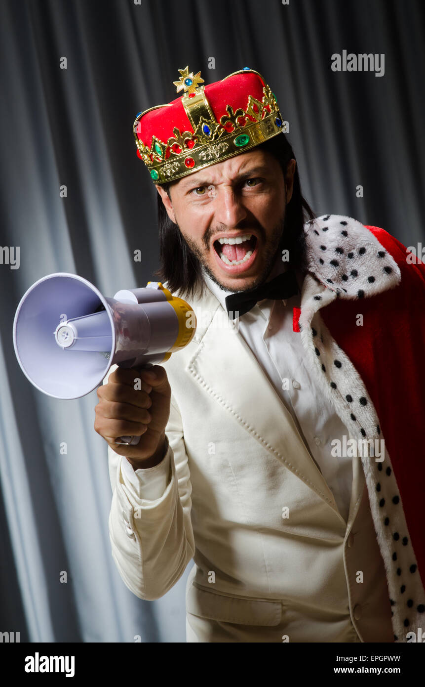 King with loudspeaker in funny concept Stock Photo - Alamy