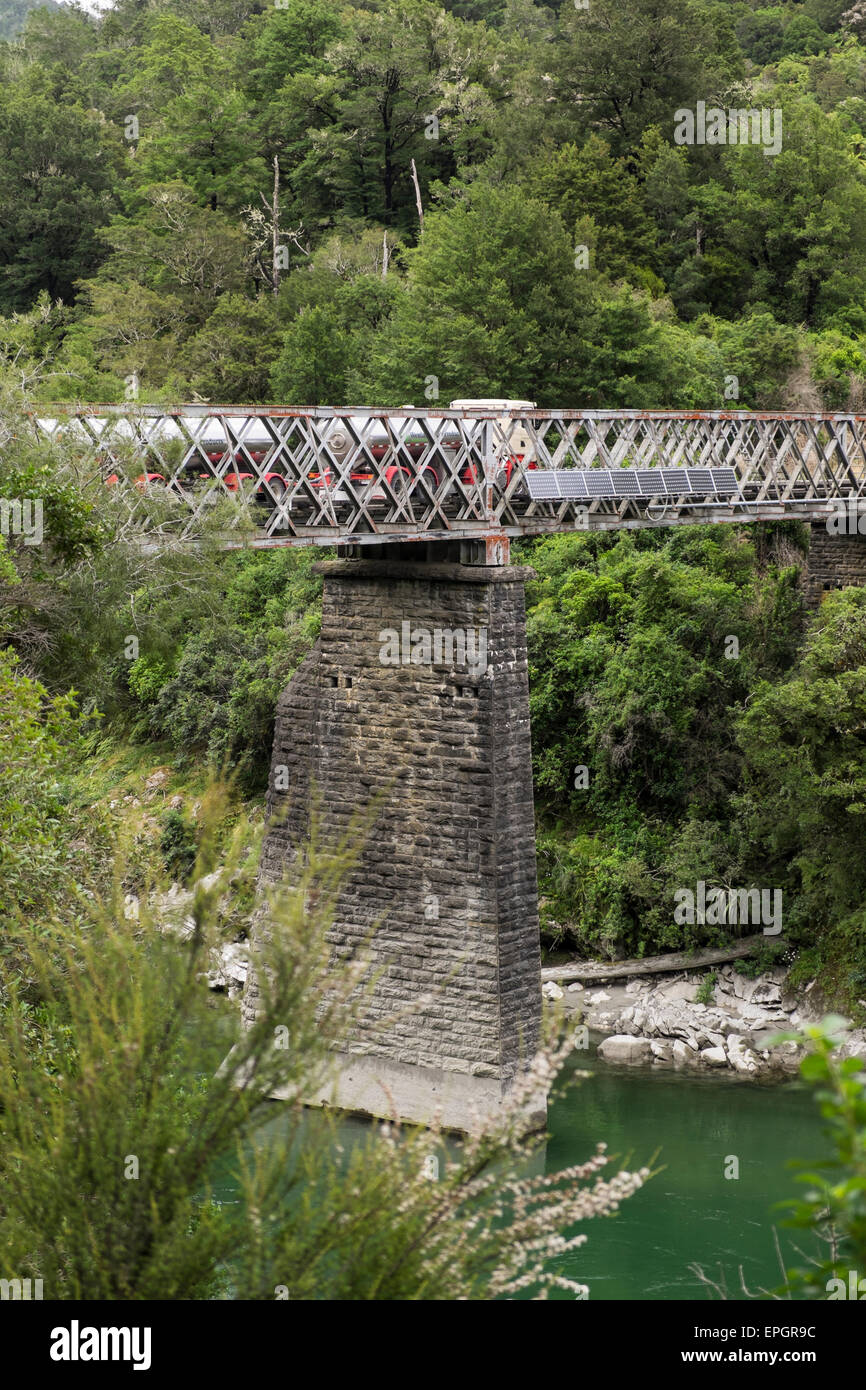 The iron bridge single lane crossing over the Buller River, New Zealand ...