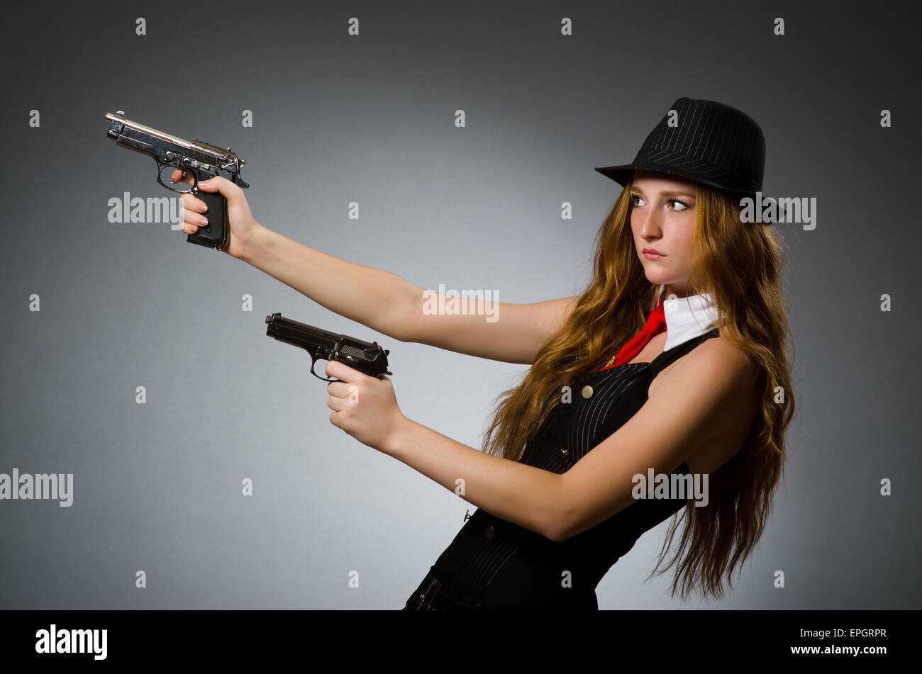Woman gangster gun in hand hi-res stock photography and images - Alamy