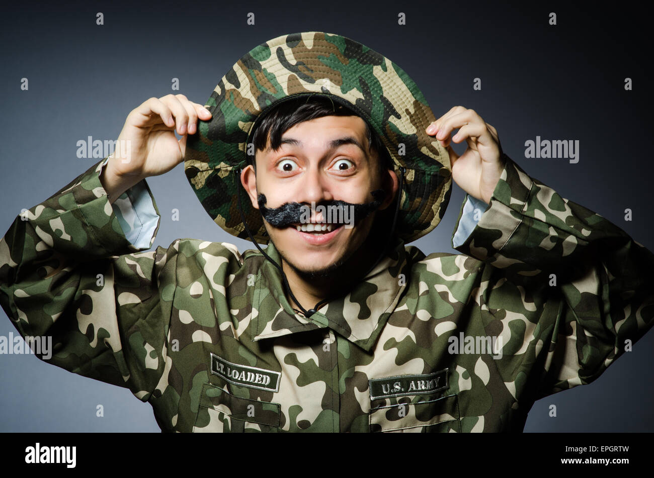 Funny soldier in military concept Stock Photo - Alamy