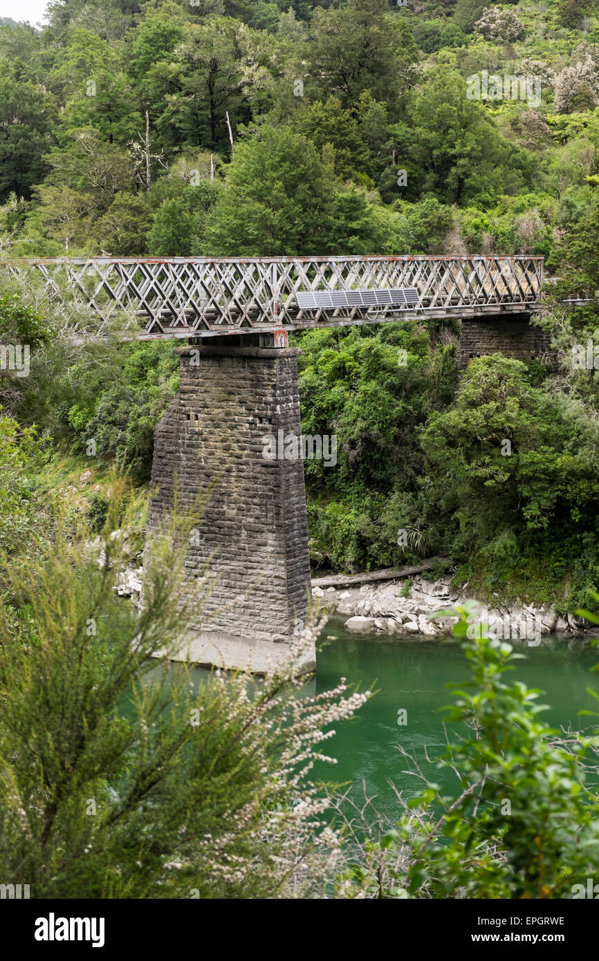 The iron bridge single lane crossing over the Buller River, New Zealand ...