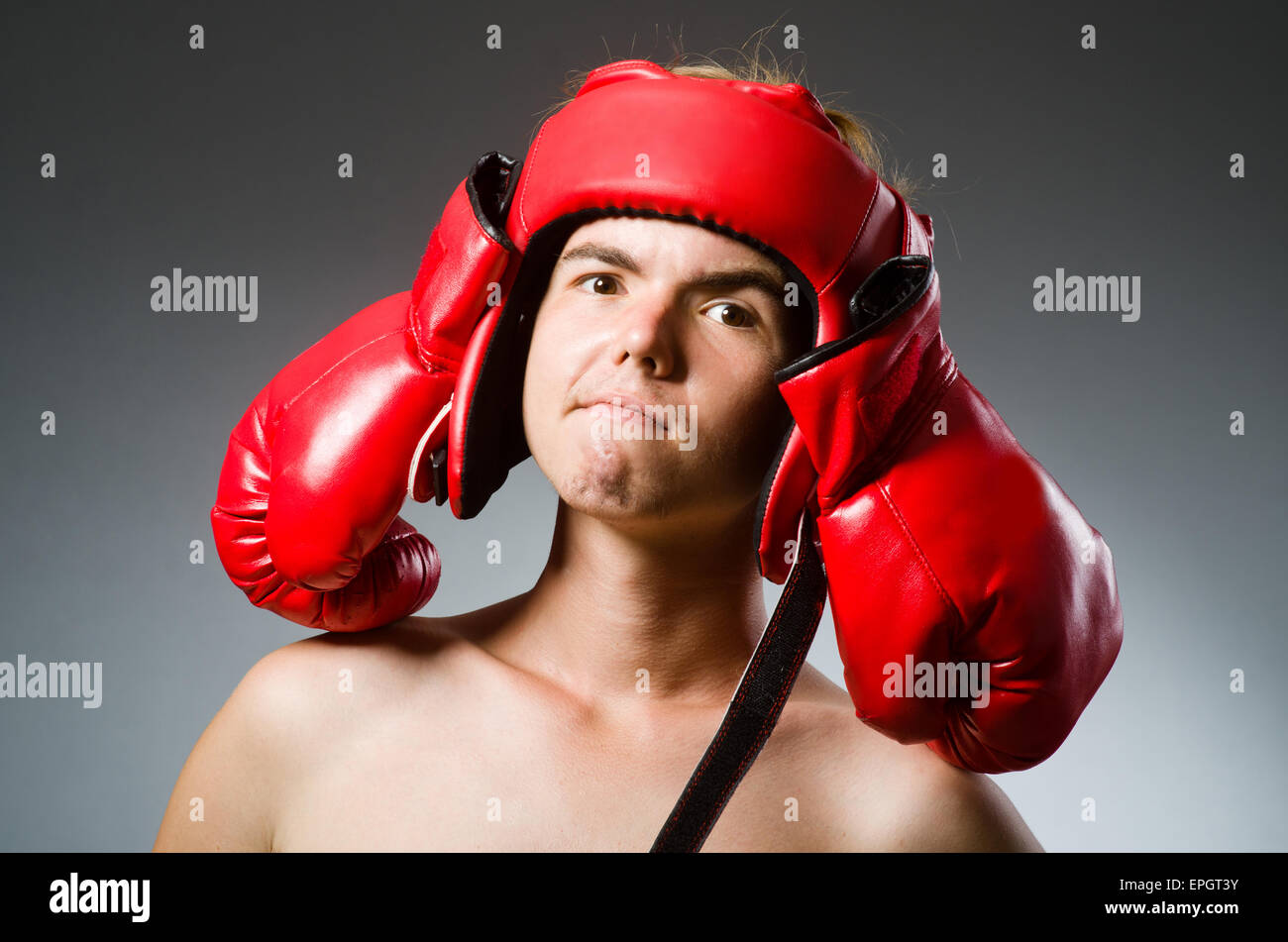 Funny boxer against dark background Stock Photo - Alamy