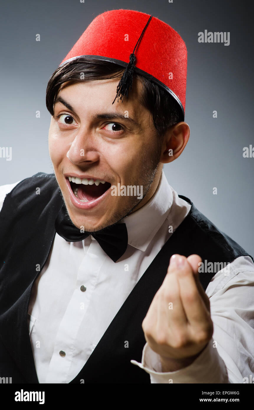 Man wearing traditional turkish hat fez Stock Photo - Alamy