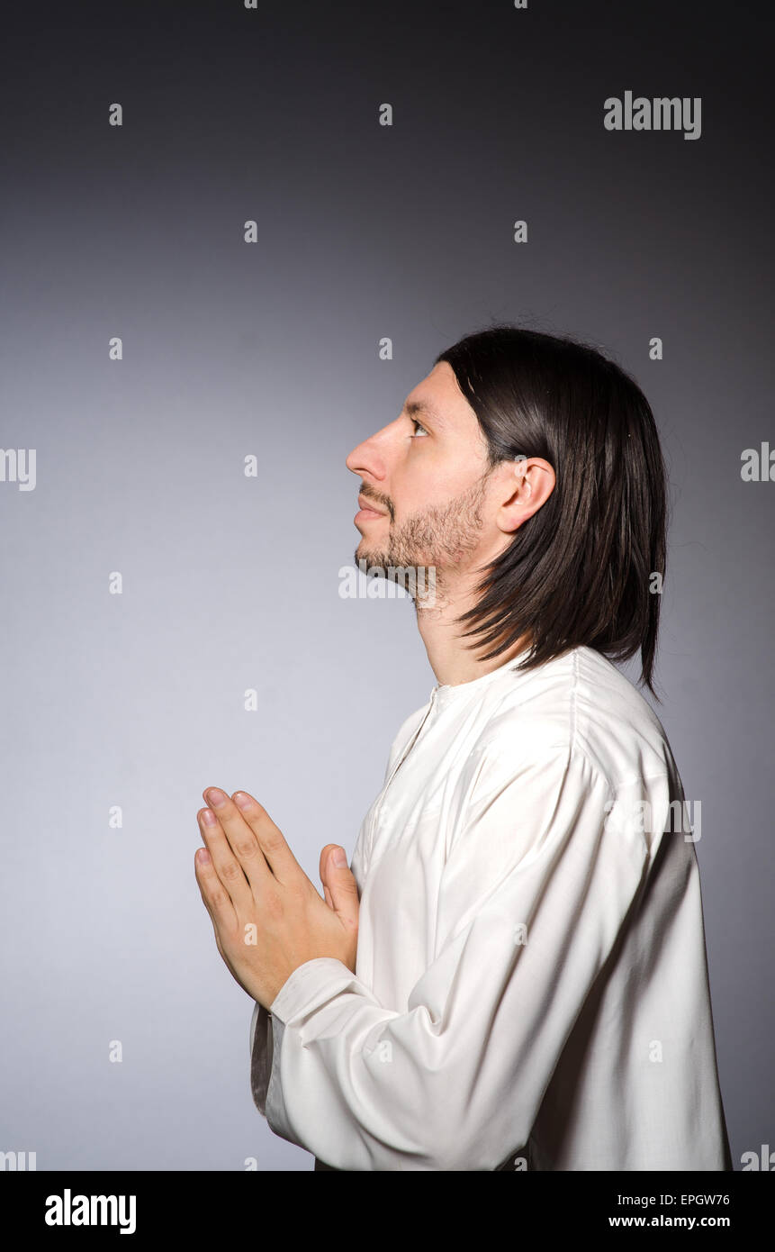 Priest man in religious concept Stock Photo - Alamy