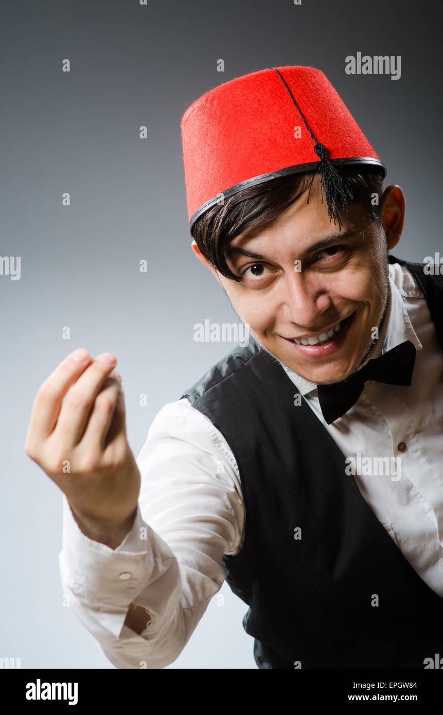 Man wearing traditional turkish hat fez Stock Photo - Alamy
