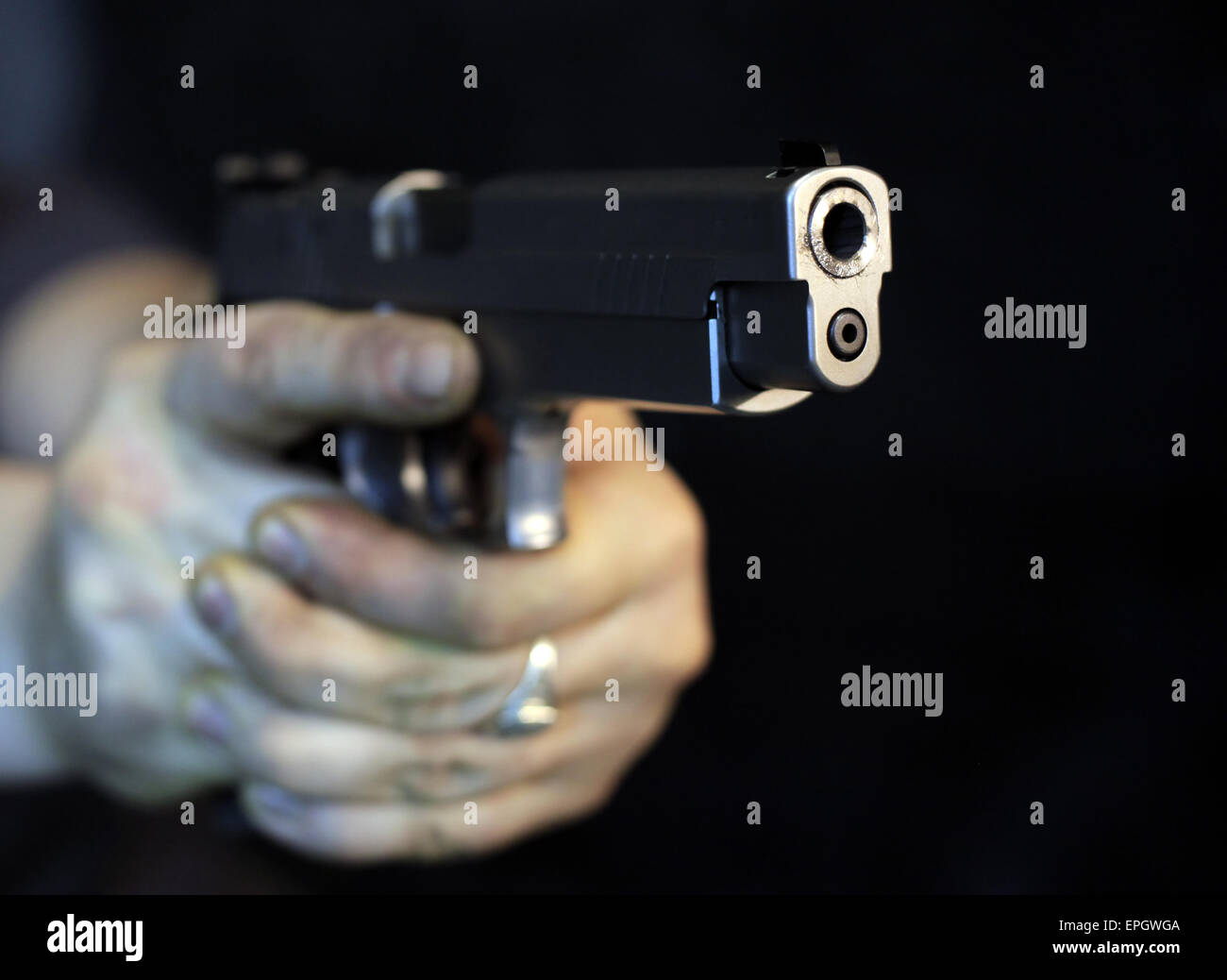 Pointing the pistol hi-res stock photography and images - Alamy