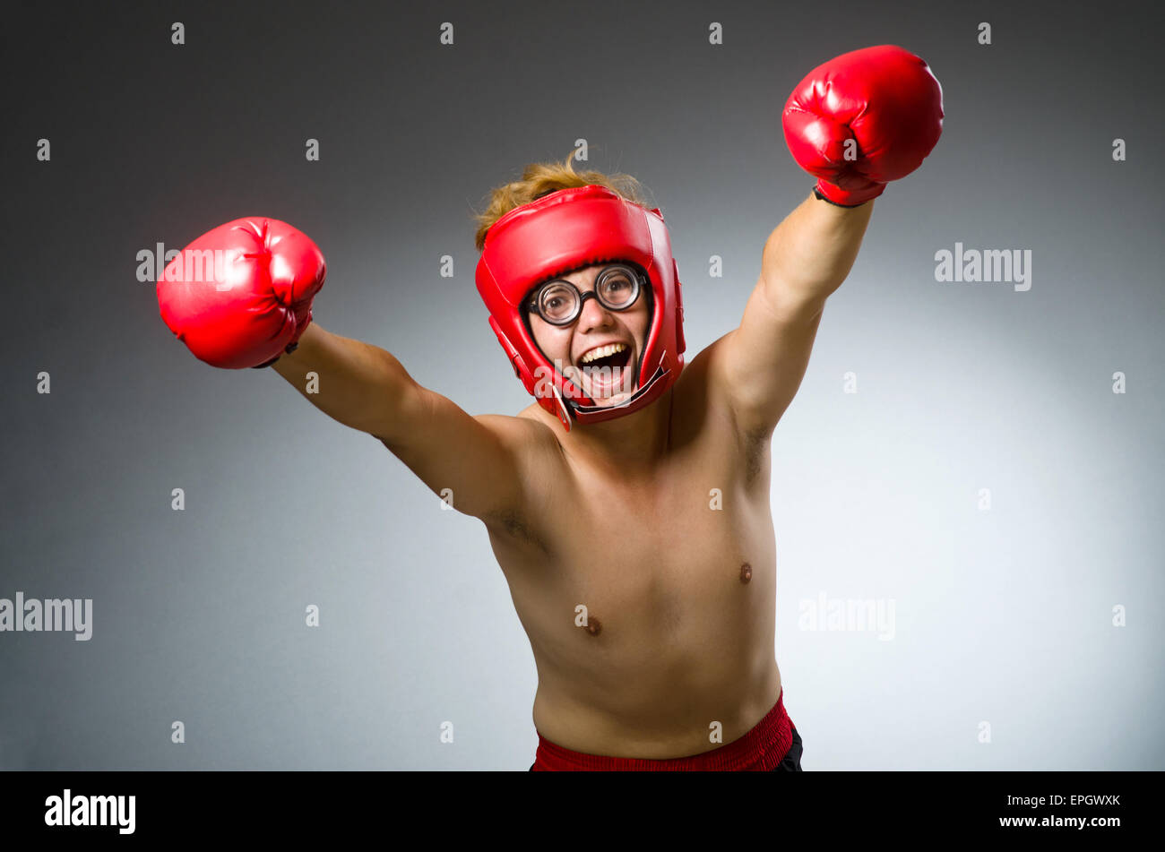 Funny boxer against dark background Stock Photo - Alamy