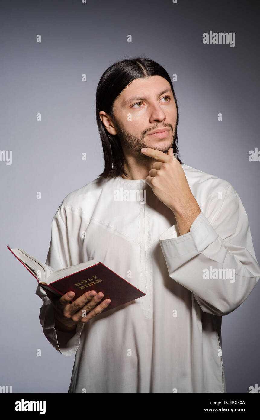Priest man in religious concept Stock Photo - Alamy