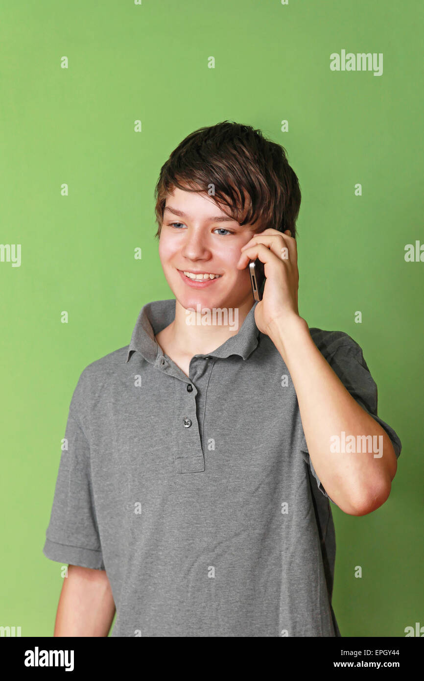Teen at phone Stock Photo - Alamy