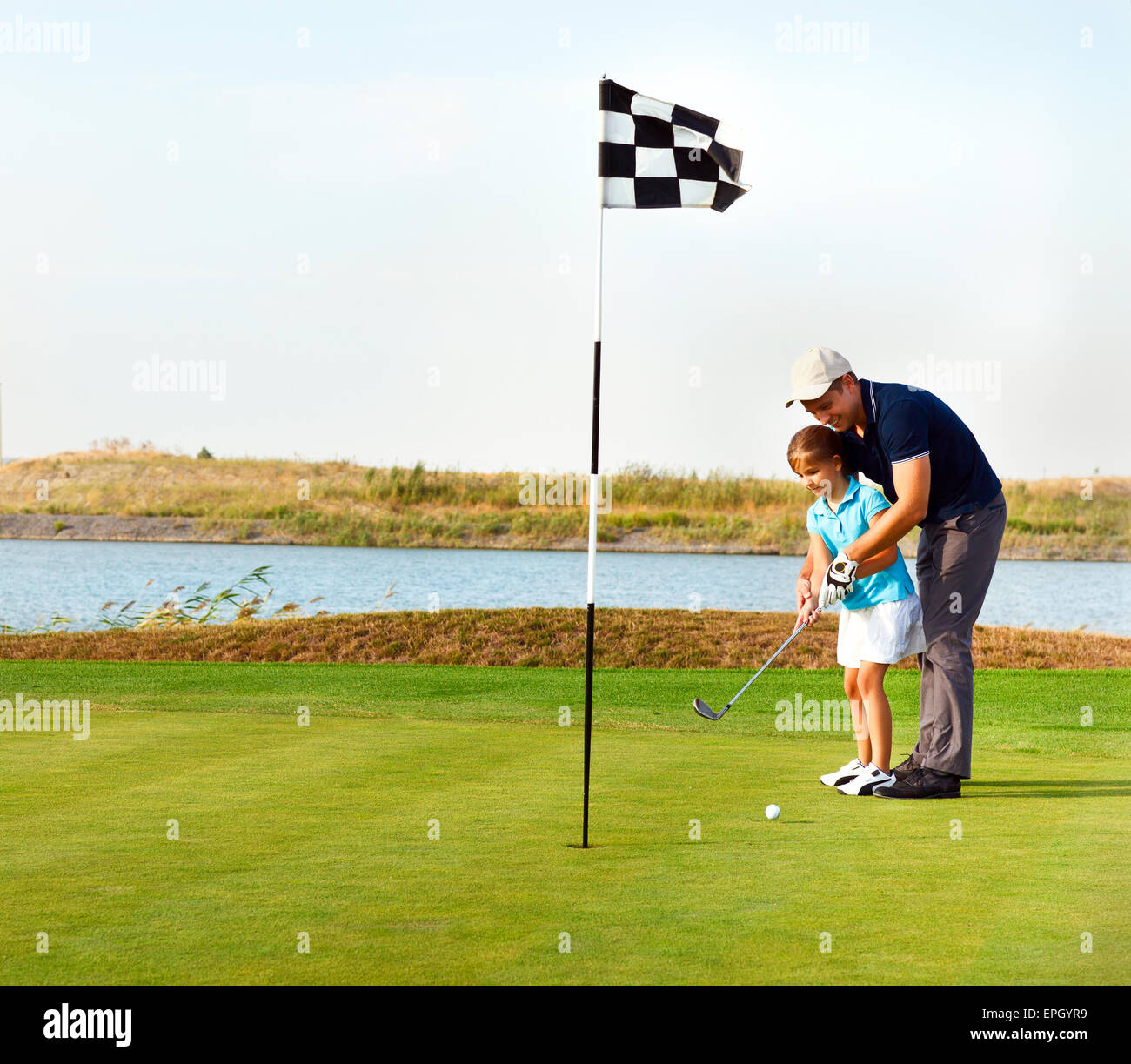 Father and daughter golf hi-res stock photography and images - Alamy