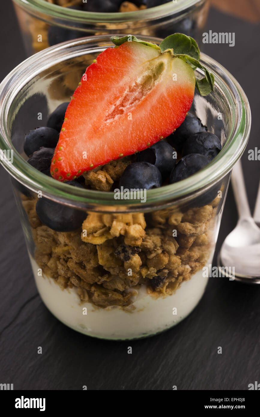 muesli and yogurt with fresh berries Stock Photo - Alamy