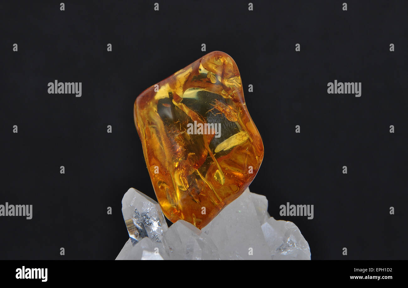 Amber on rock crystal Stock Photo - Alamy