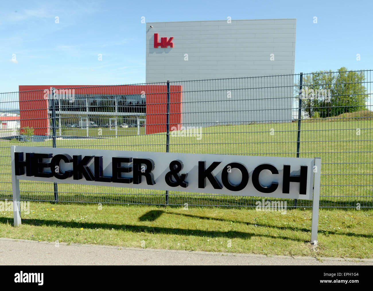 The logo of weapons manufacturer Heckler & Koch in front of the company ...