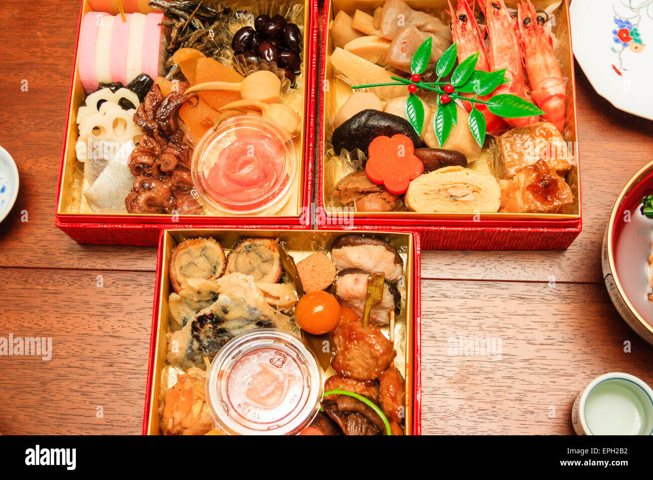 A Japanese new year food set on a table. Called an Osechi-ryori, and ...