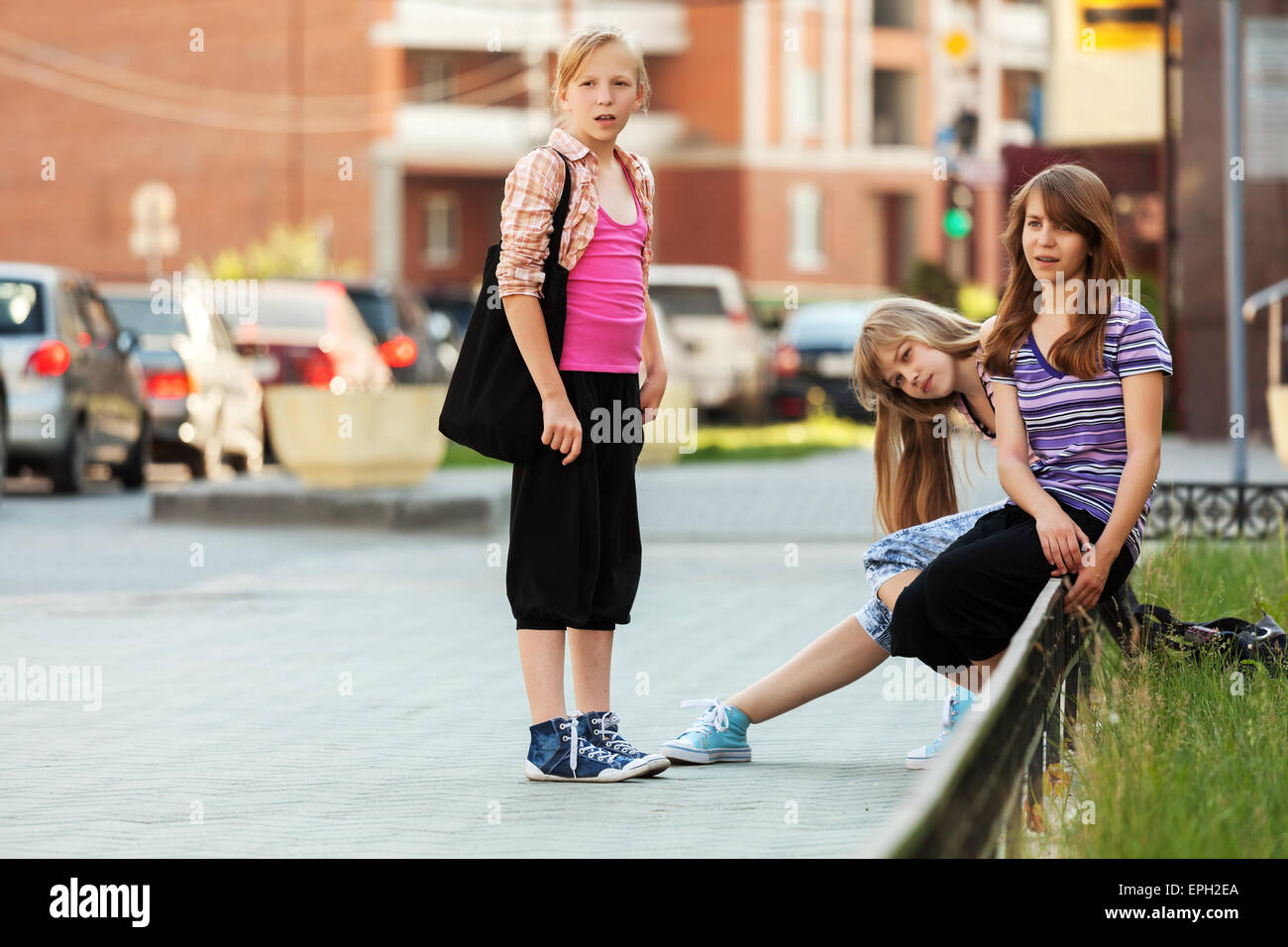 Group of school girls on the city street Stock Photo - Alamy
