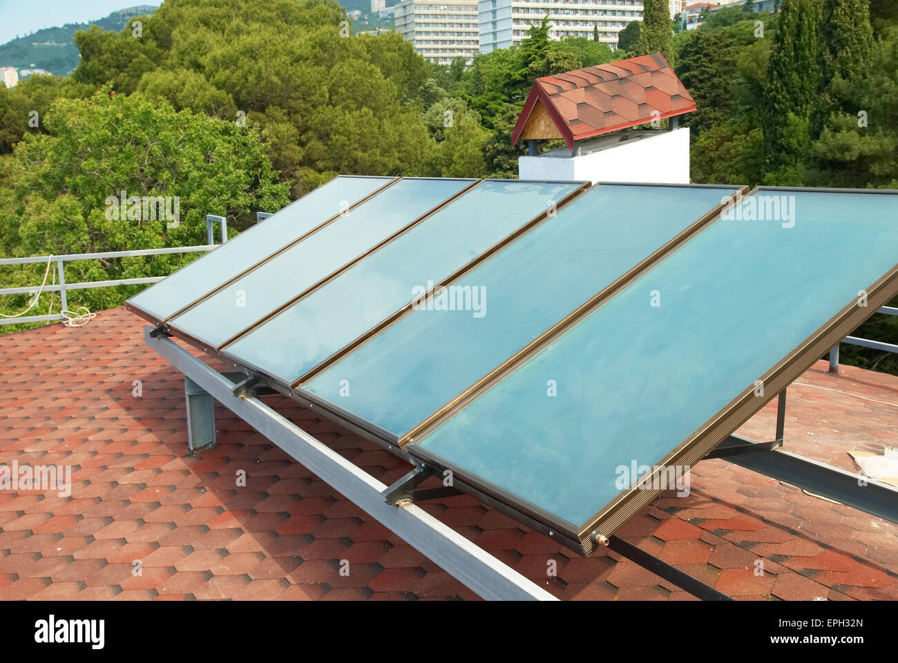 Solar system on the roof Stock Photo - Alamy