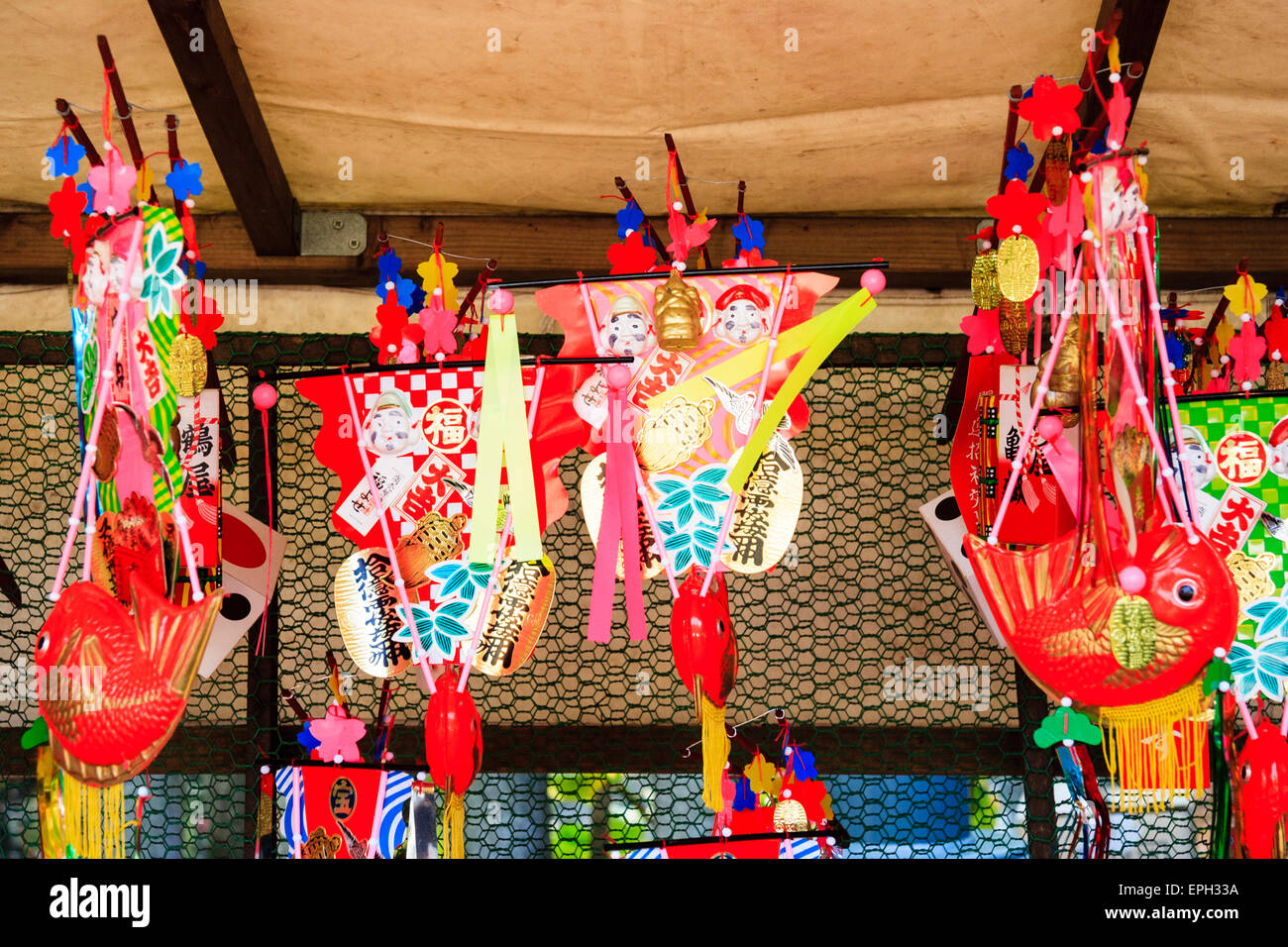 Good luck charms, red Kumade, ornamental bamboo rakes decorated with a ...