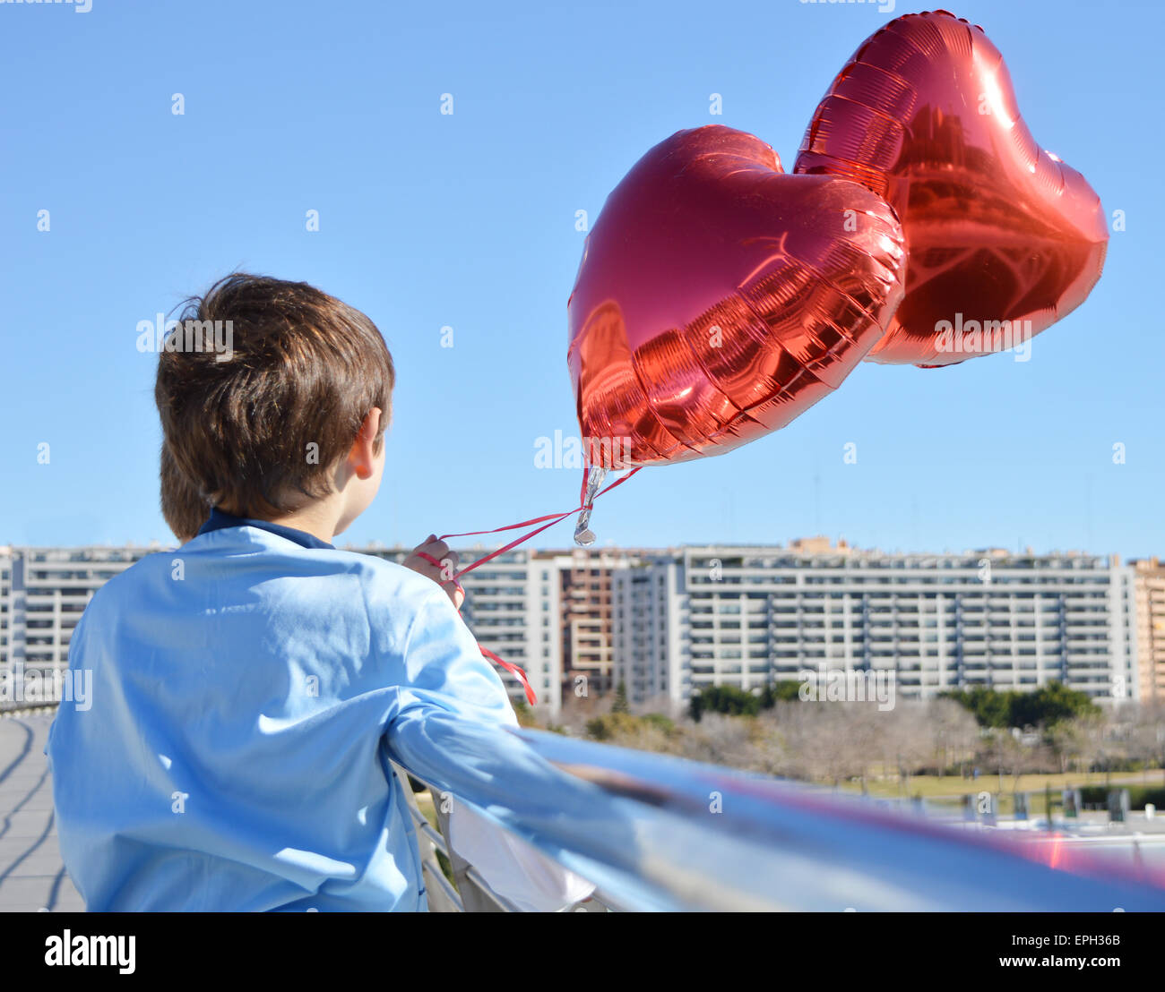Happy kids balloons hi-res stock photography and images - Alamy