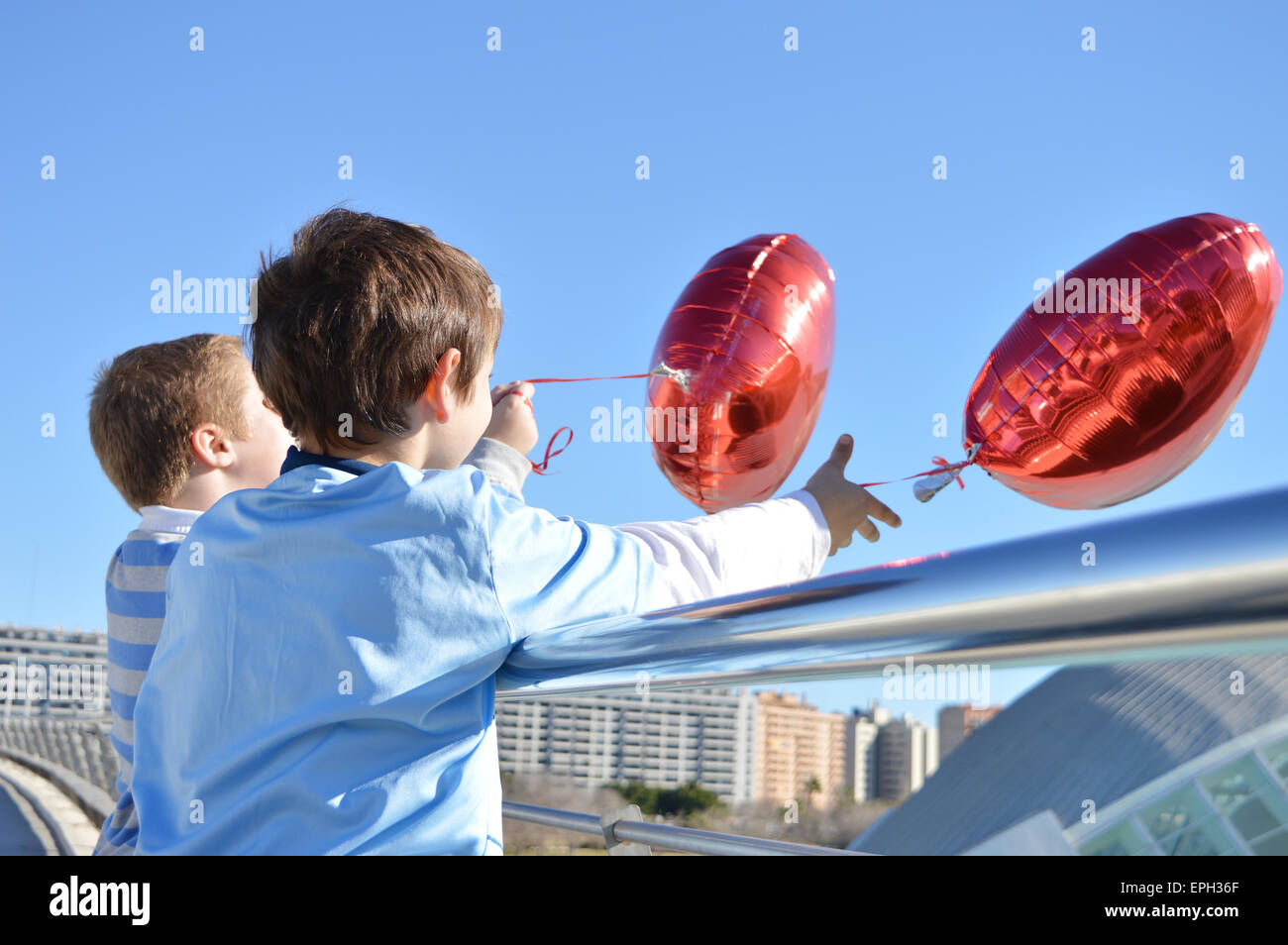 kids with balloons Stock Photo - Alamy
