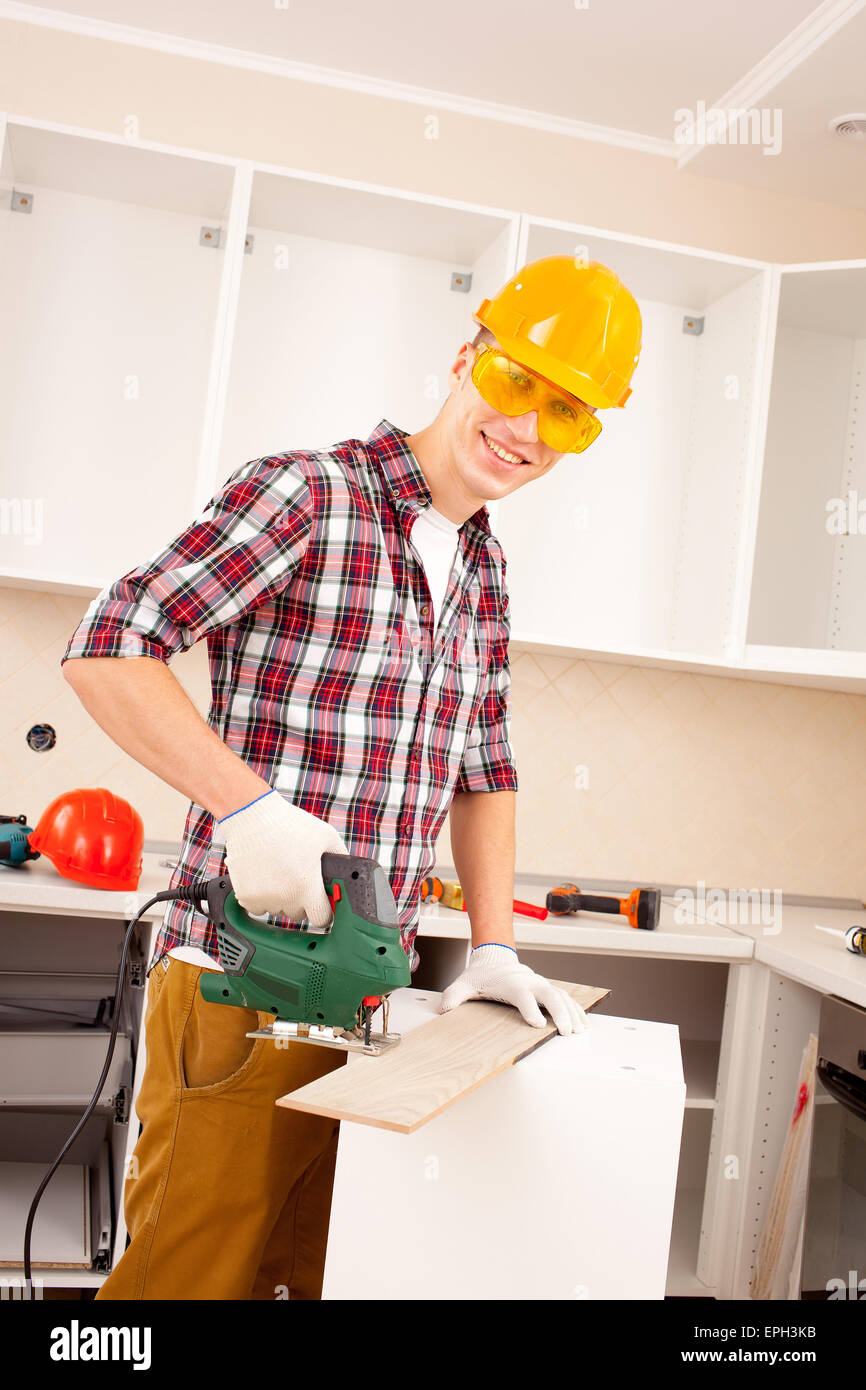 Manual jigsaw hi-res stock photography and images - Alamy