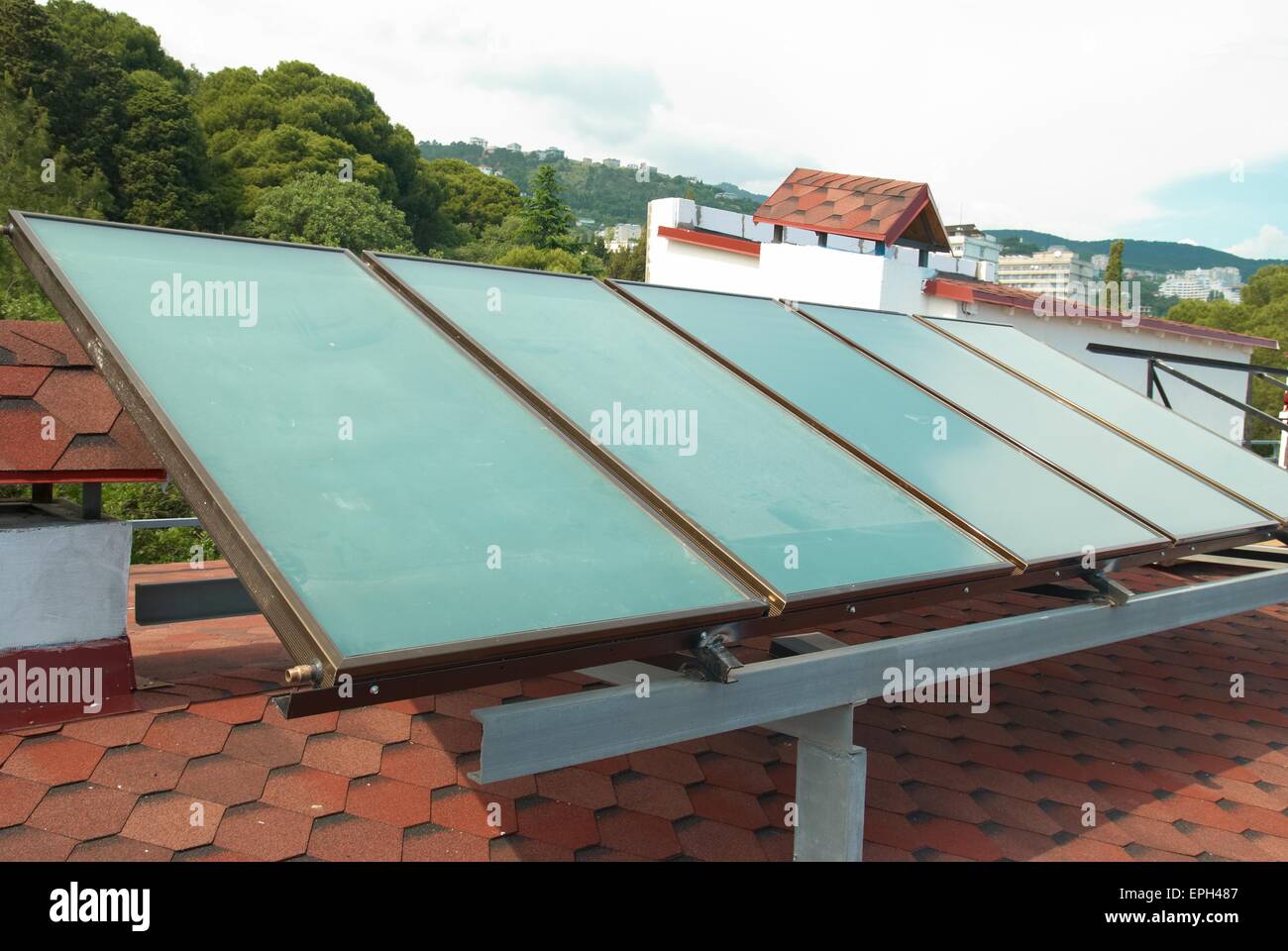 Solar system on the roof Stock Photo - Alamy