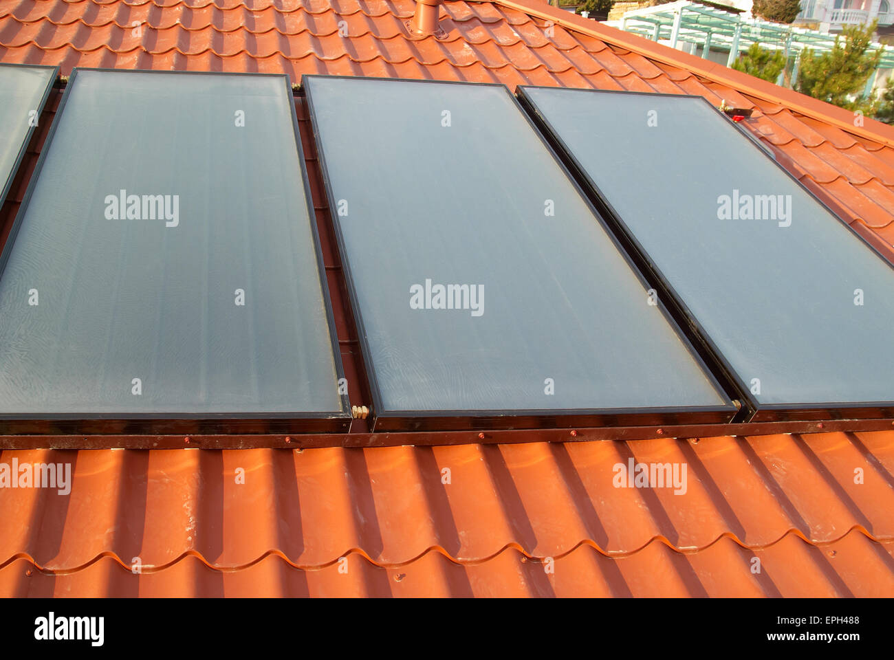 Solar system on the roof Stock Photo - Alamy