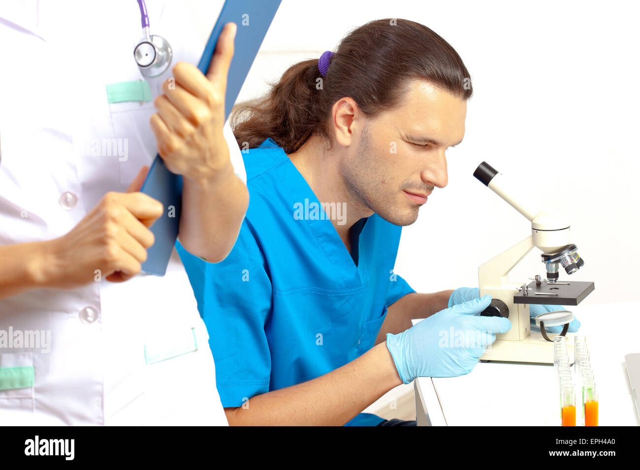 Look through microscope hi-res stock photography and images - Alamy