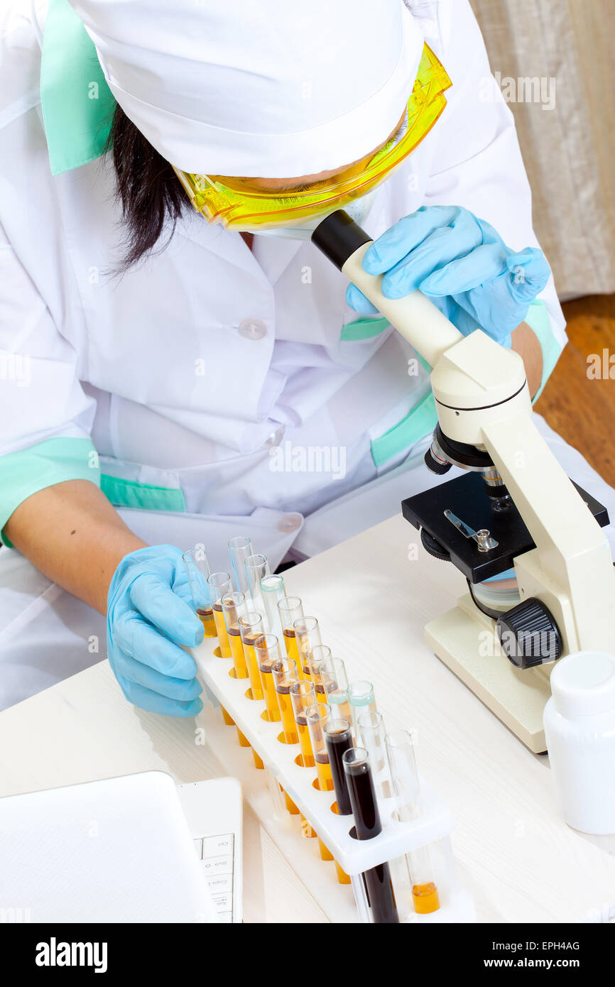 medical scientist with microscope Stock Photo - Alamy